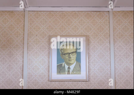 Exhibition with official portrait of Erich Honecker, East German ...