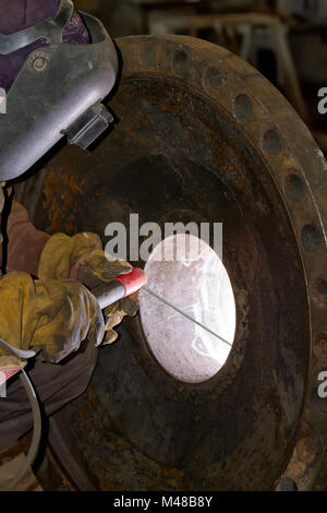 Repair of parts of the apparatus for manual arc welding Stock Photo - Alamy