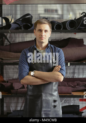 Leather workshop owner Stock Photo - Alamy