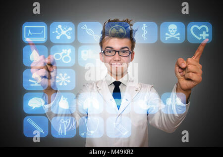 Man doctor pressing buttons with various medical icons Stock Photo - Alamy