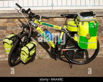An ambulance service cycle response unit bicycle in the Uk Stock Photo ...