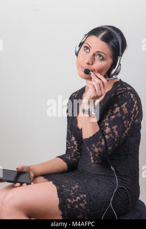 Bored customer service agent Stock Photo - Alamy