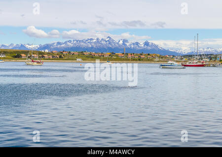 Beagle channel, mountains and buildings in Ushuaia, Patagonia ...