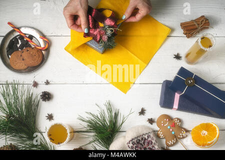 Gift packaging still life on the white wooden background top view Stock ...