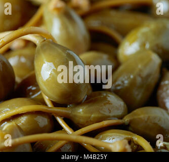 Pickled caper berries . Edible fruits of Capparis . Berries are used as ...