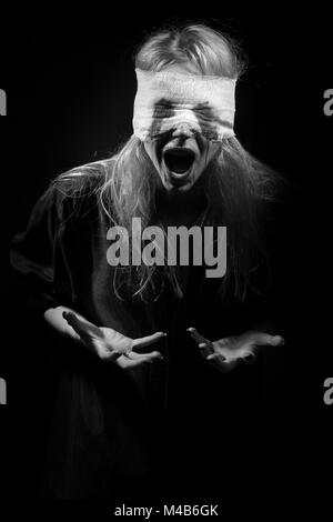 wounded scared bloody girl screaming on black background Stock Photo ...