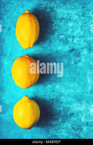 Lemon and cyan background Stock Photo - Alamy