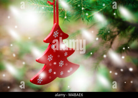Christmas decoration with toys and ornaments on a brown textured ...