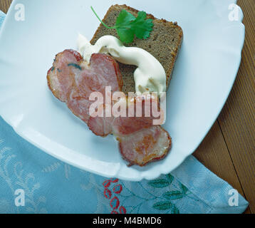 Swedish speciality bread with bacon ,white sauce Stock Photo - Alamy