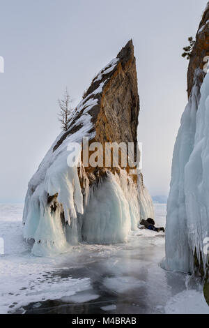 Icicles on rocks on Lake Baikal Stock Photo - Alamy