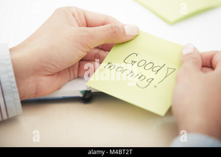 Good morning greeting on sticky notes, office desk Stock Photo - Alamy