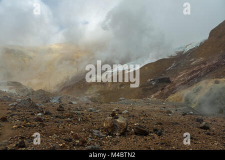 Beautiful slopes Mutnovsky volcano shrouded in clouds Stock Photo - Alamy