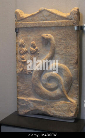 Relief with Zeus Meilichios depicted as a snake. 350-300 BC. National ...