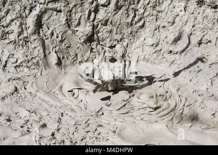 Bubbling mudhole in volcanic area Stock Photo - Alamy