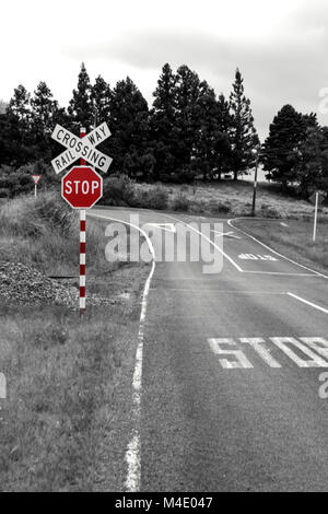 New Zealand road sign - Railway level crossing at a right angle Stock ...