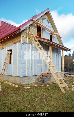 The under construction wooden house autumn Stock Photo - Alamy