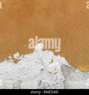 Wall covered with plaster crashed Stock Photo - Alamy