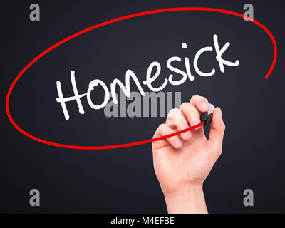 Man Hand writing You Are Not Alone with black marker on visual screen ...