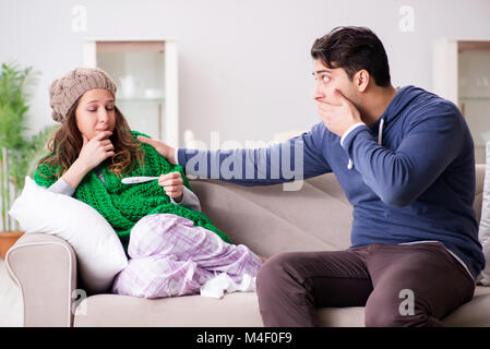 The husband caring for sick wife Stock Photo - Alamy