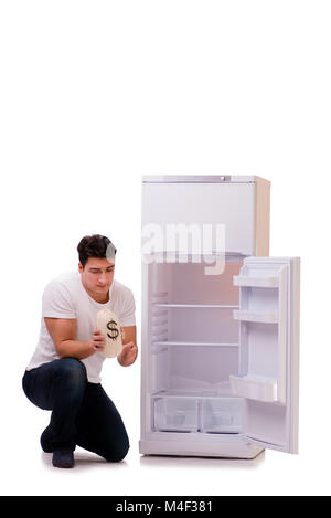 Hungry man looking for money to fill the fridge Stock Photo - Alamy