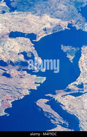 Airplane over the mountains Stock Photo - Alamy