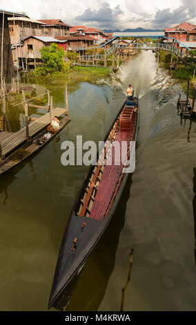 Nampan: house on stilts, canal, boat, Inle Lake, Shan State, Myanmar ...
