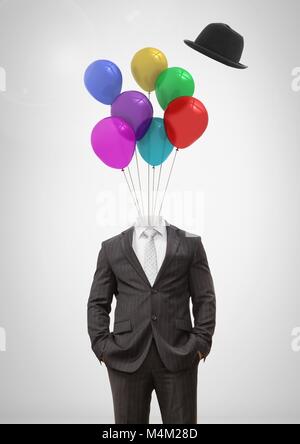 Headless man with surreal floating hat and heart balloon Stock Photo ...