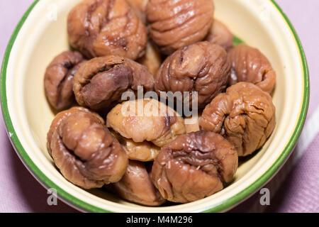 roast pickled chestnuts in bowl Stock Photo - Alamy