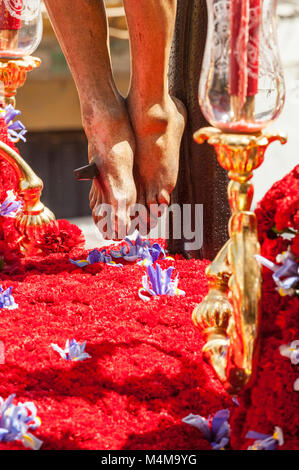 nailed feet , detail of wooden statue of Jesus Christ crucified Stock Photo - Alamy