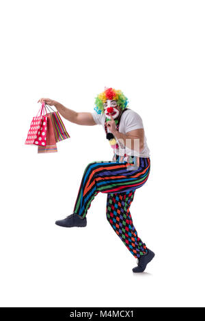 Funny clown with shopping bags isolated on white background Stock Photo ...