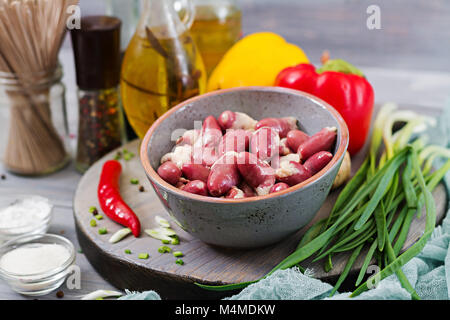 Raw chicken hearts heap for cooking Stock Photo - Alamy