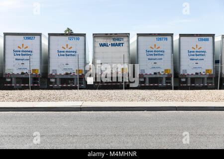 Walmart Inc., logos on a row of semi-truck trailers in Phoenix, Arizona ...