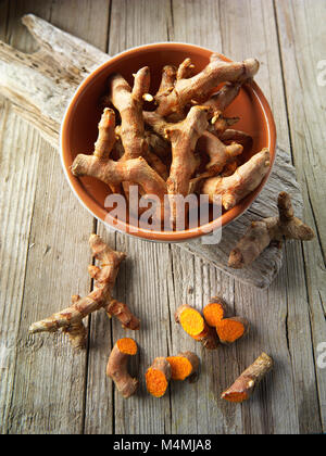 Raw fresh natural turmeric - curcuma roots Stock Photo - Alamy