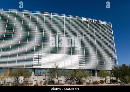 A logo sign outside of the headquarters of First Solar, Inc., in Tempe ...