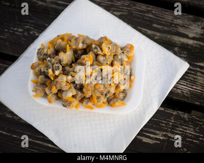 A takeaway plate of Cockles from a seafood stall from Old Leigh in ...