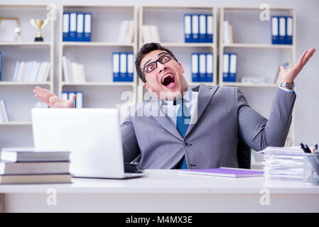 Funny businessman clown acting silly in the office Stock Photo - Alamy