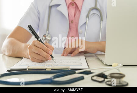 Doctors are recorded patient data for analysis Stock Photo - Alamy