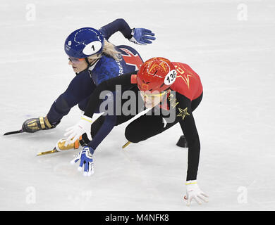 Pyeongchang. 17th Feb, 2018. Li Jinyu (L) of China poses for photos ...