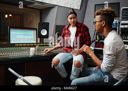 Collaboration, teamwork or music recording group and sound headphones ...