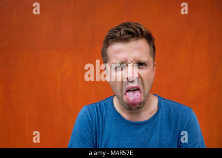 grimace of disgust. portrait of young boy grimacing of disgusty ...