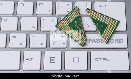 Broken modern processor with critical security error. Destroyed CPU on computer keyboard detail ...
