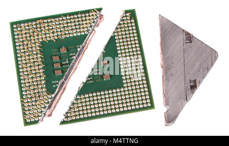 Broken modern processor with critical security error. Destroyed CPU on computer keyboard detail ...