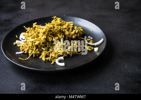 Traditional georgian dish - jonjoli, on rustic table with copyspace ...