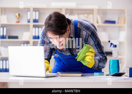 Hacker under cleaner cover stealing personal data Stock Photo - Alamy