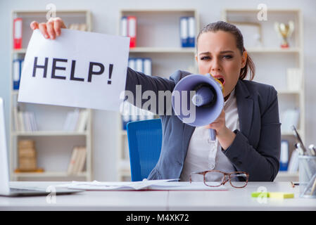 Businesswoman pleading for help in office Stock Photo - Alamy