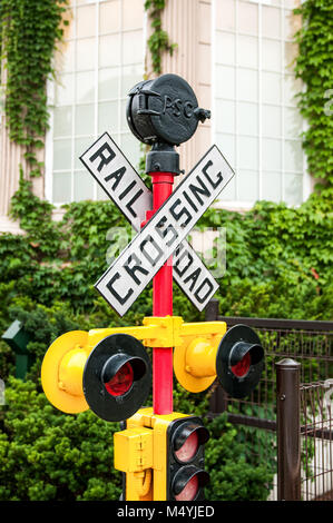 traffic light for the railroad. yellow signal at the crossing. the path ...