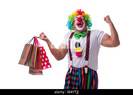 Funny clown after shopping bags isolated on white background Stock ...