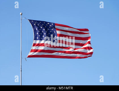 American flag waving in strong wind Stock Photo - Alamy