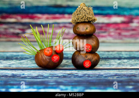 fantasy autumn figures made from chestnuts Stock Photo - Alamy