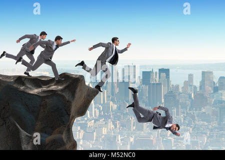 Business people falling off the cliff Stock Photo - Alamy